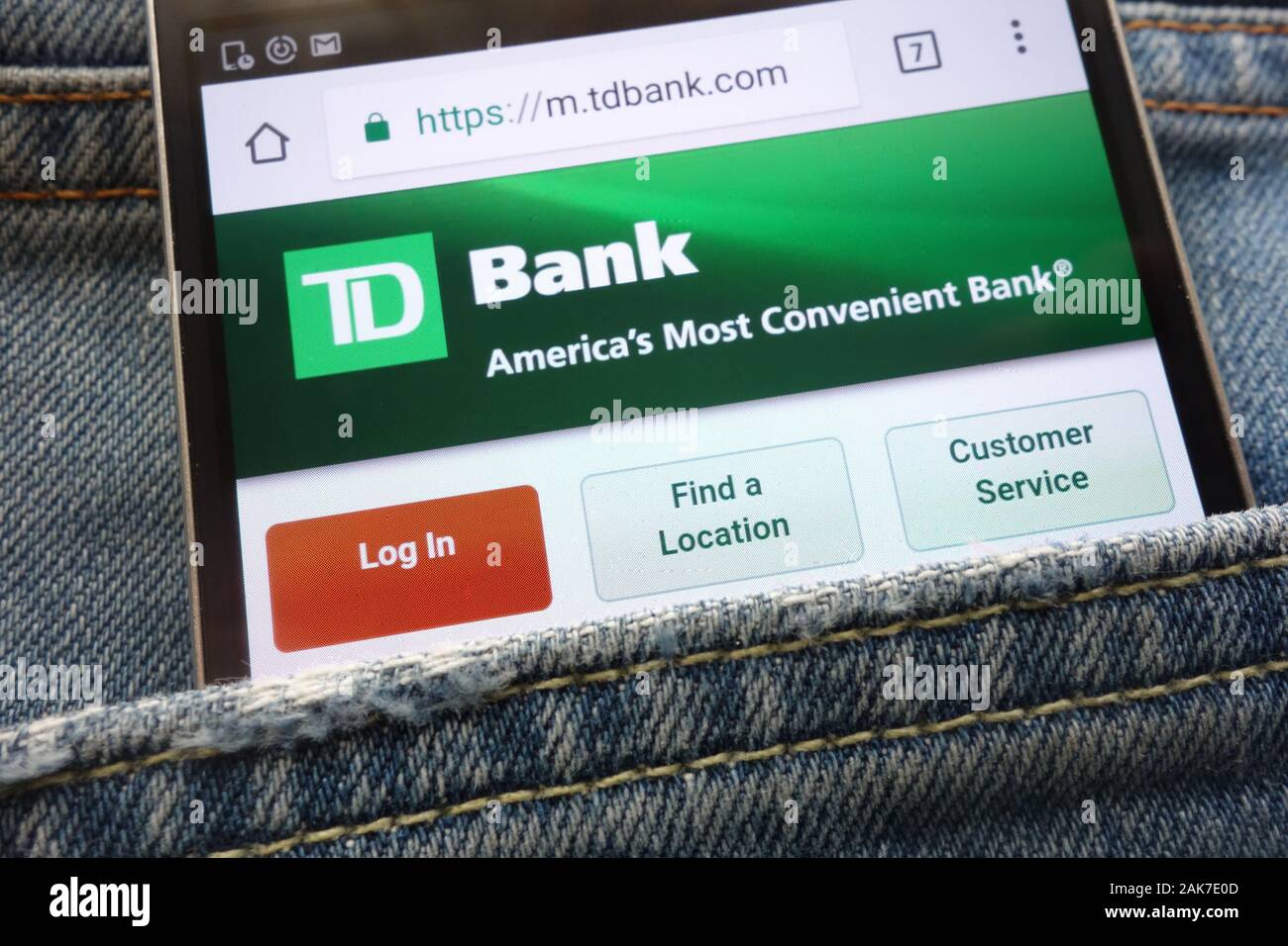 TD Bank website displayed on smartphone hidden in jeans pocket Stock ...