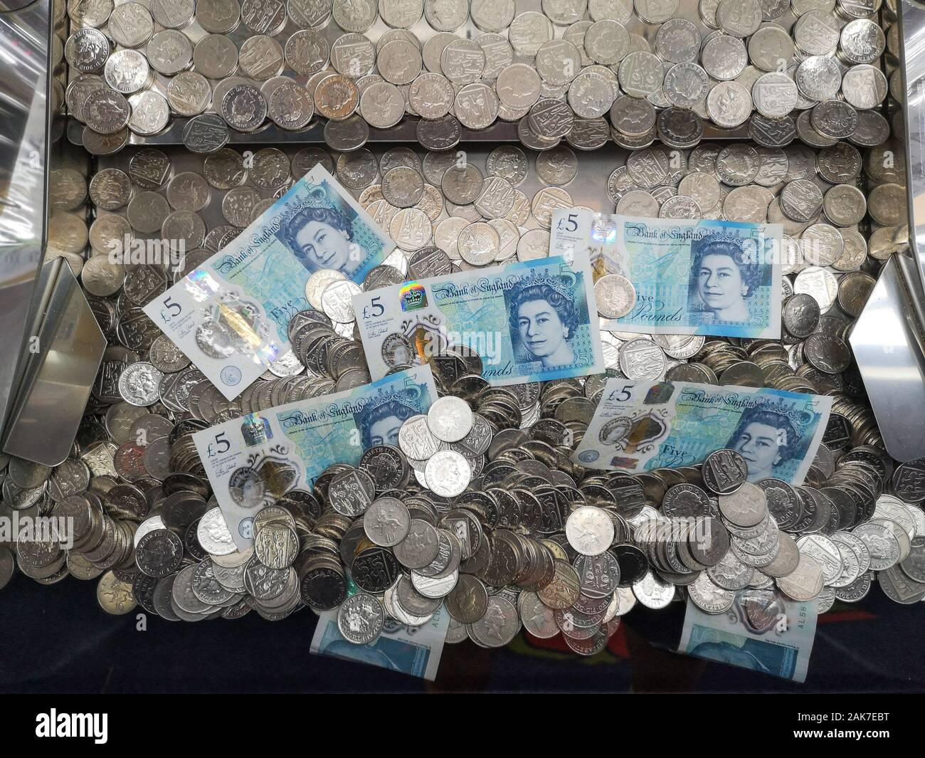 Coin pusher hi-res stock photography and images - Alamy