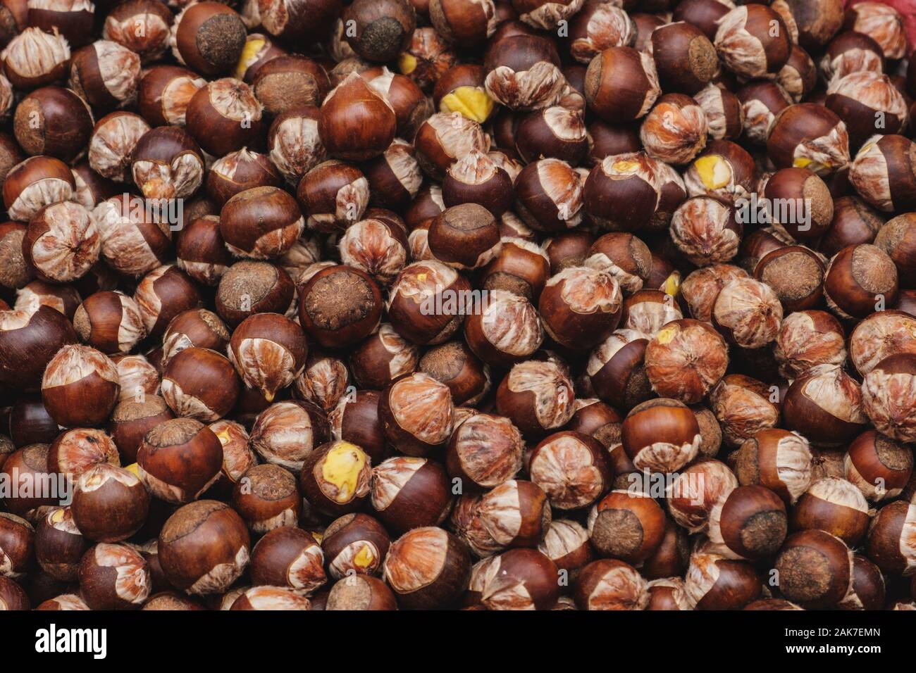 chestnut background, chestnuts on market closeup Stock Photo - Alamy