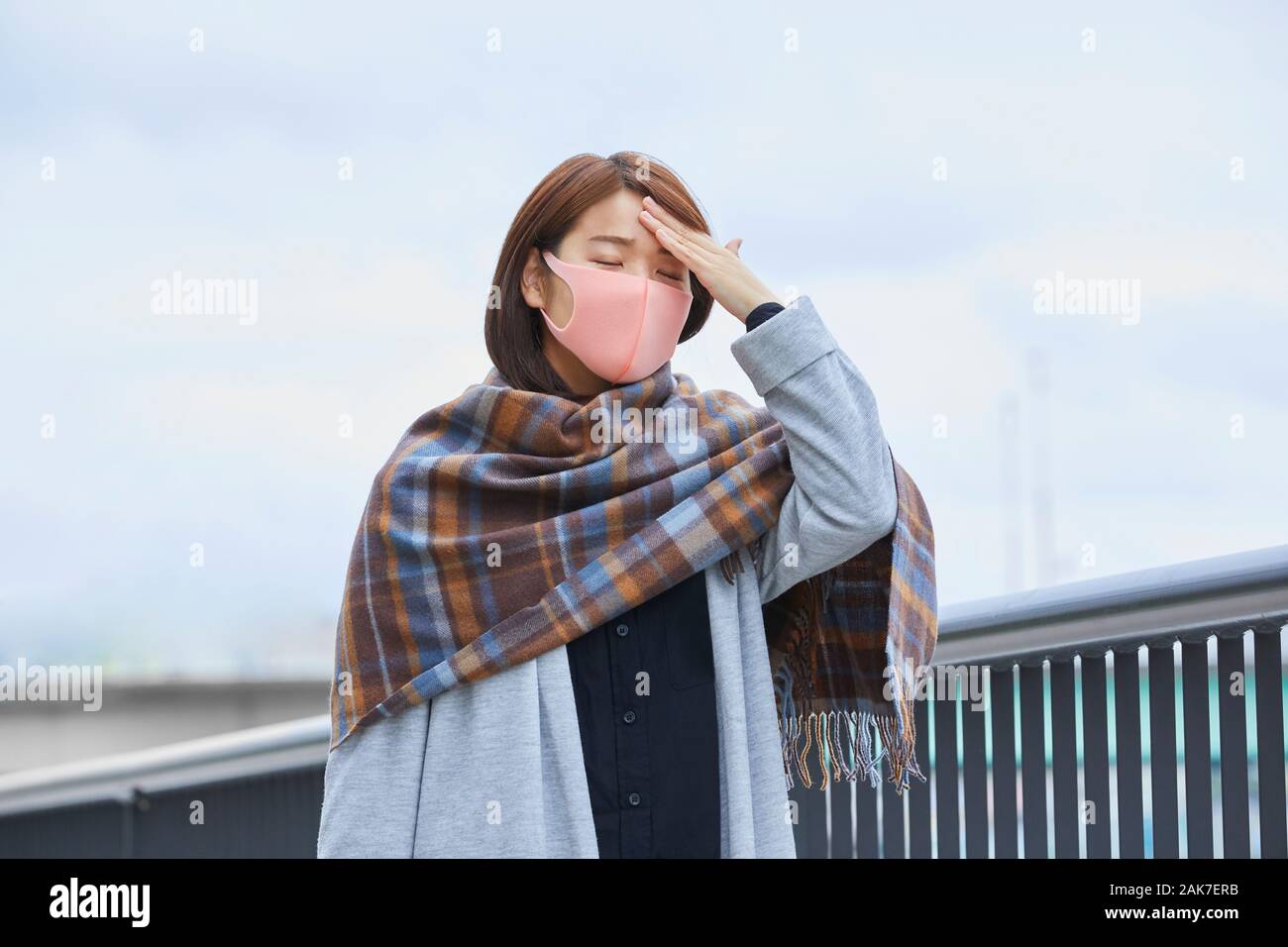Japanese woman wearing mask Stock Photo - Alamy