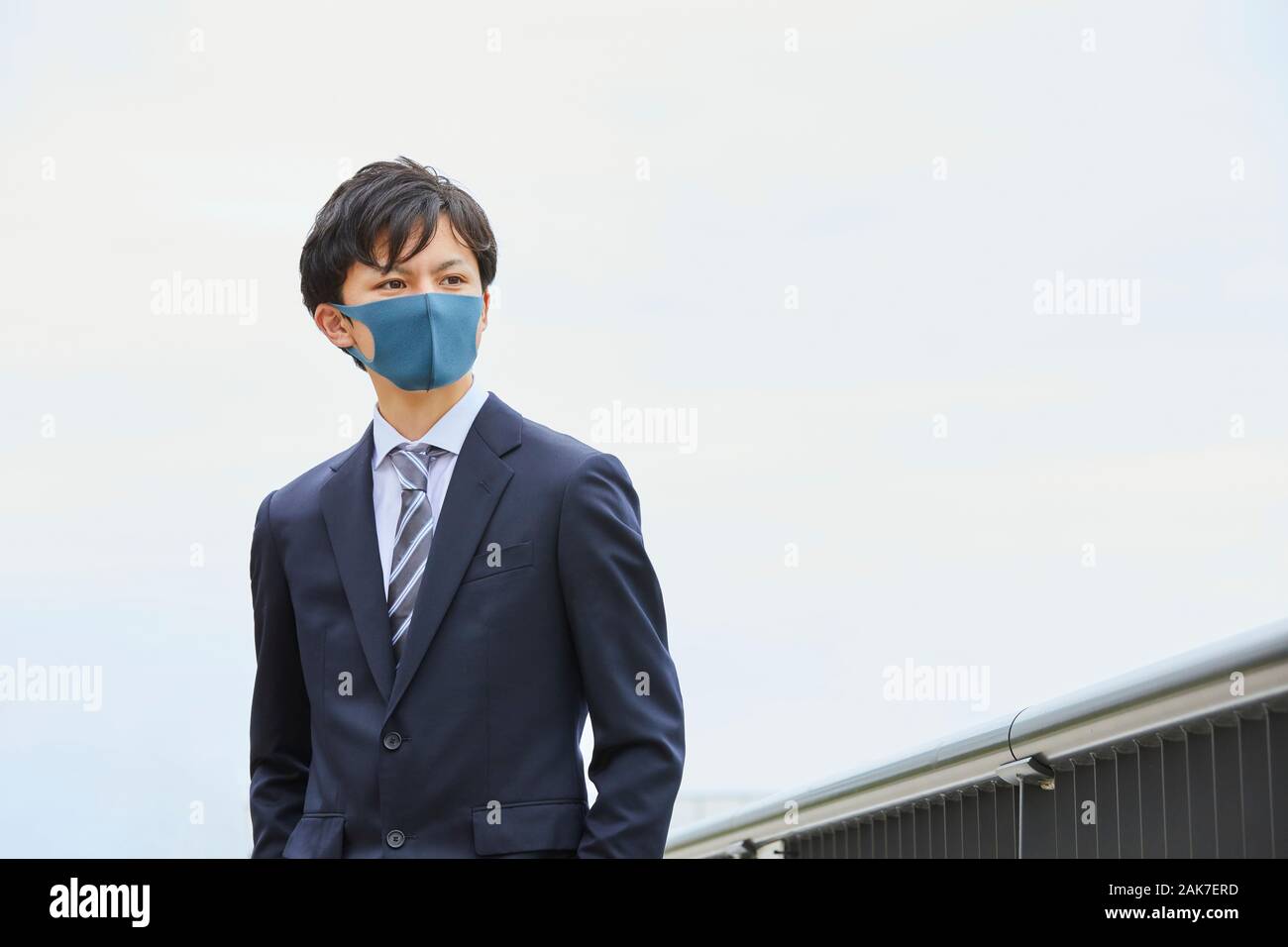 Japanese man wearing mask Stock Photo - Alamy