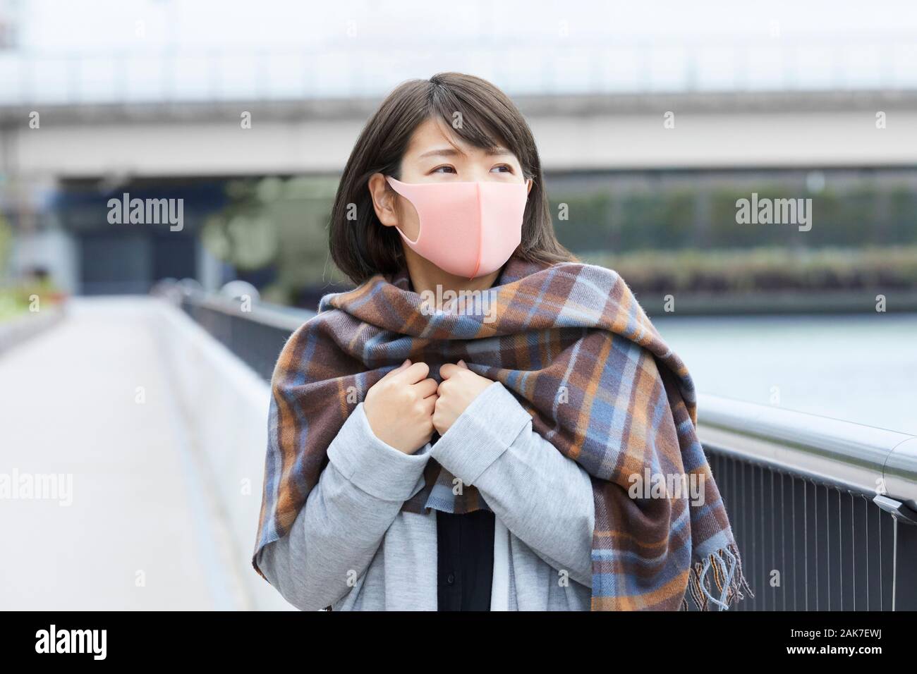 Japanese woman wearing mask Stock Photo - Alamy