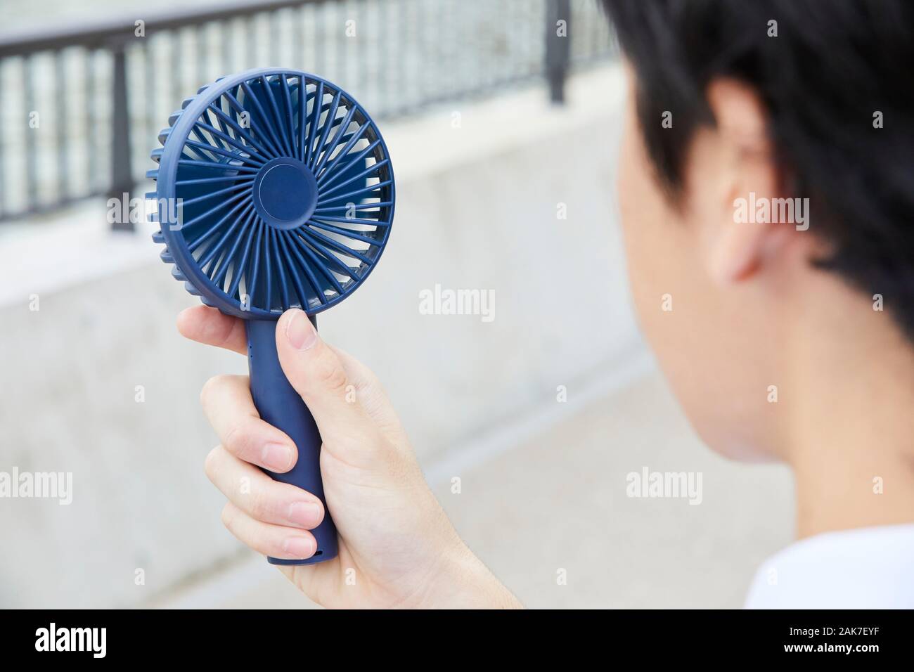 Man portable fan and hi-res stock photography and images - Alamy