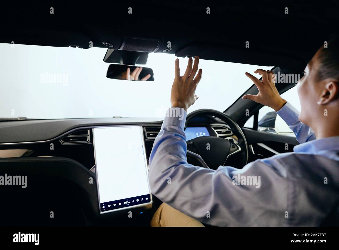 Japanese man in self driving car Stock Photo - Alamy