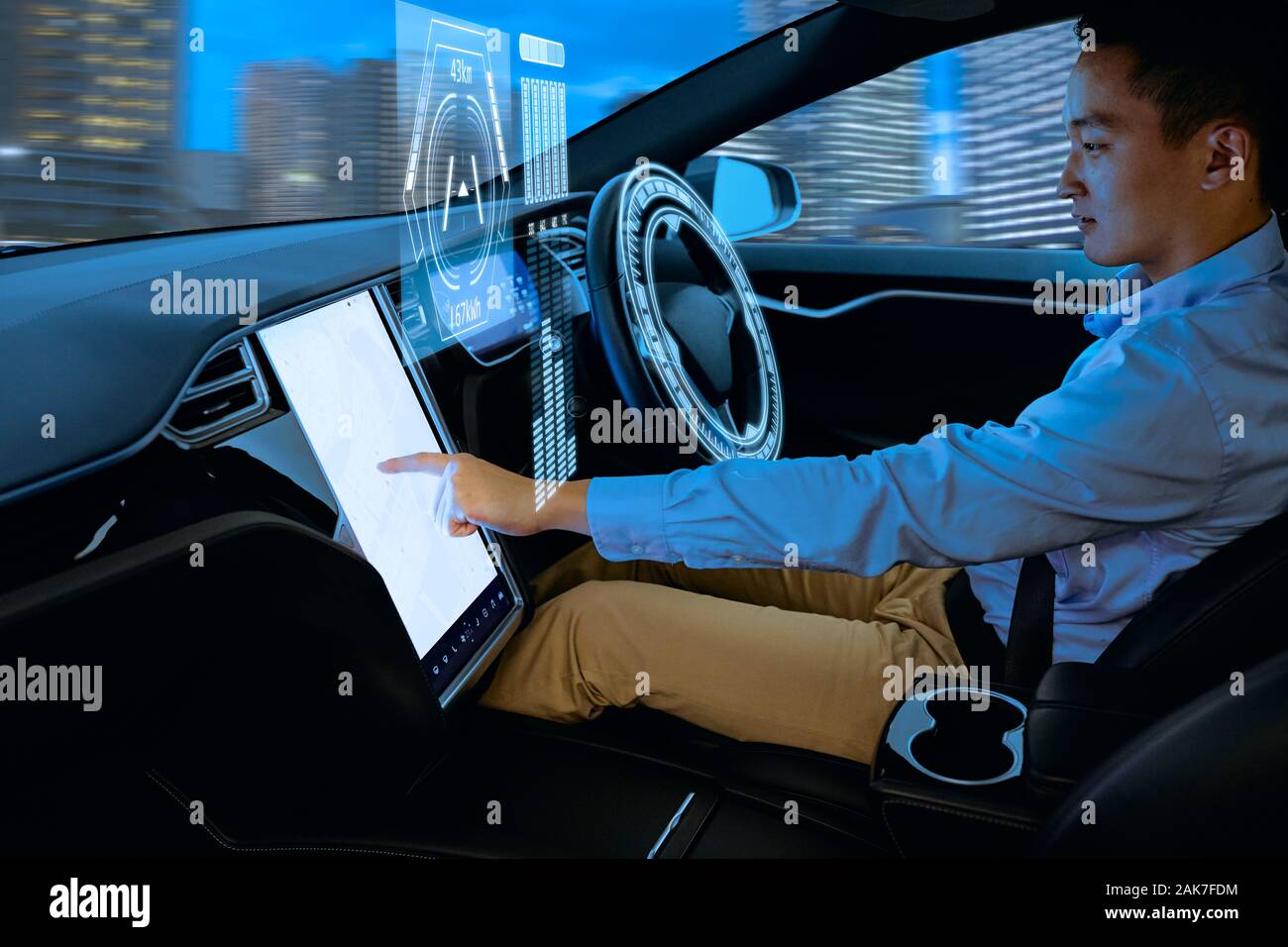 Japanese man in self driving car Stock Photo - Alamy