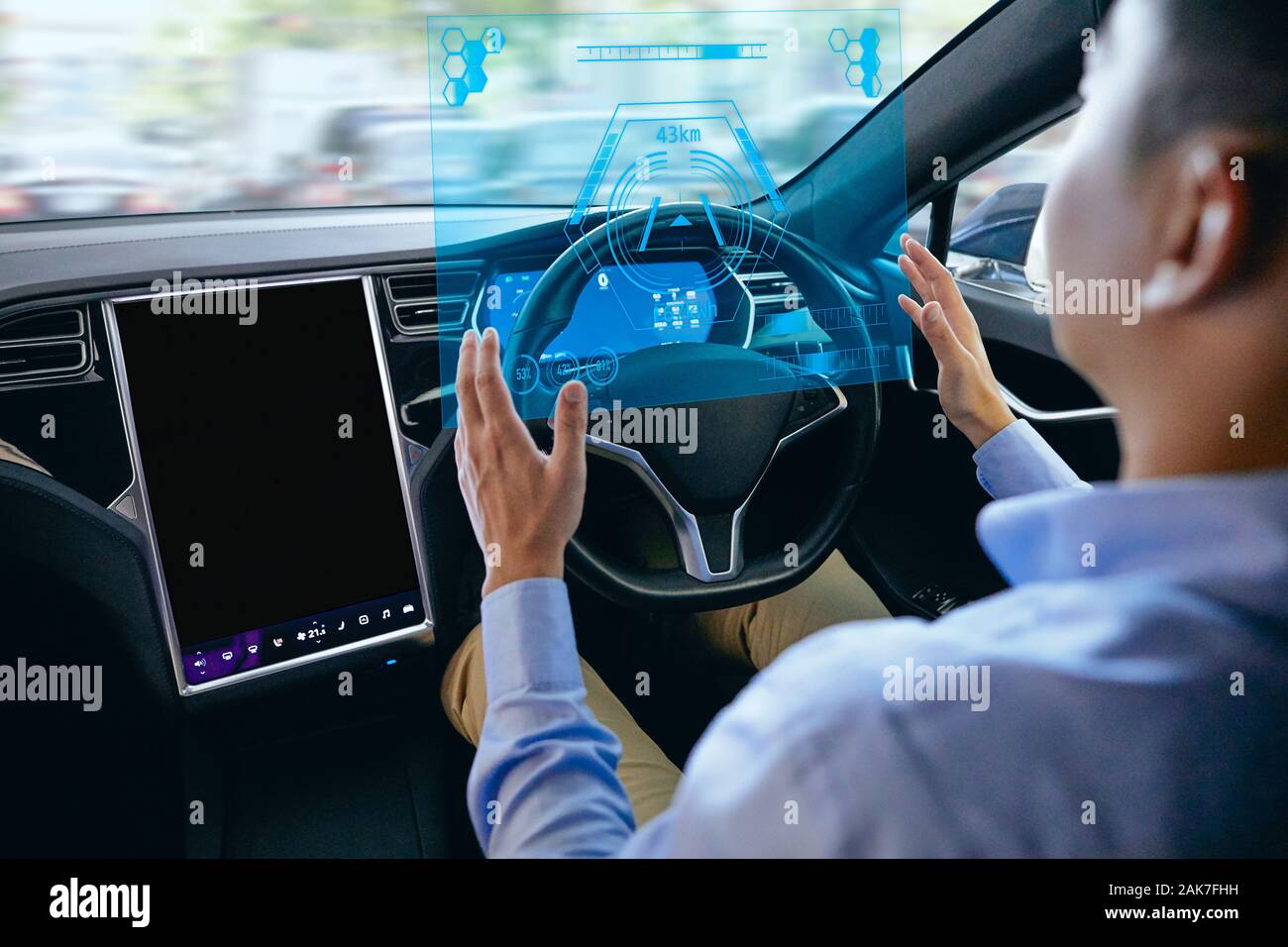 Japanese man in self driving car Stock Photo - Alamy