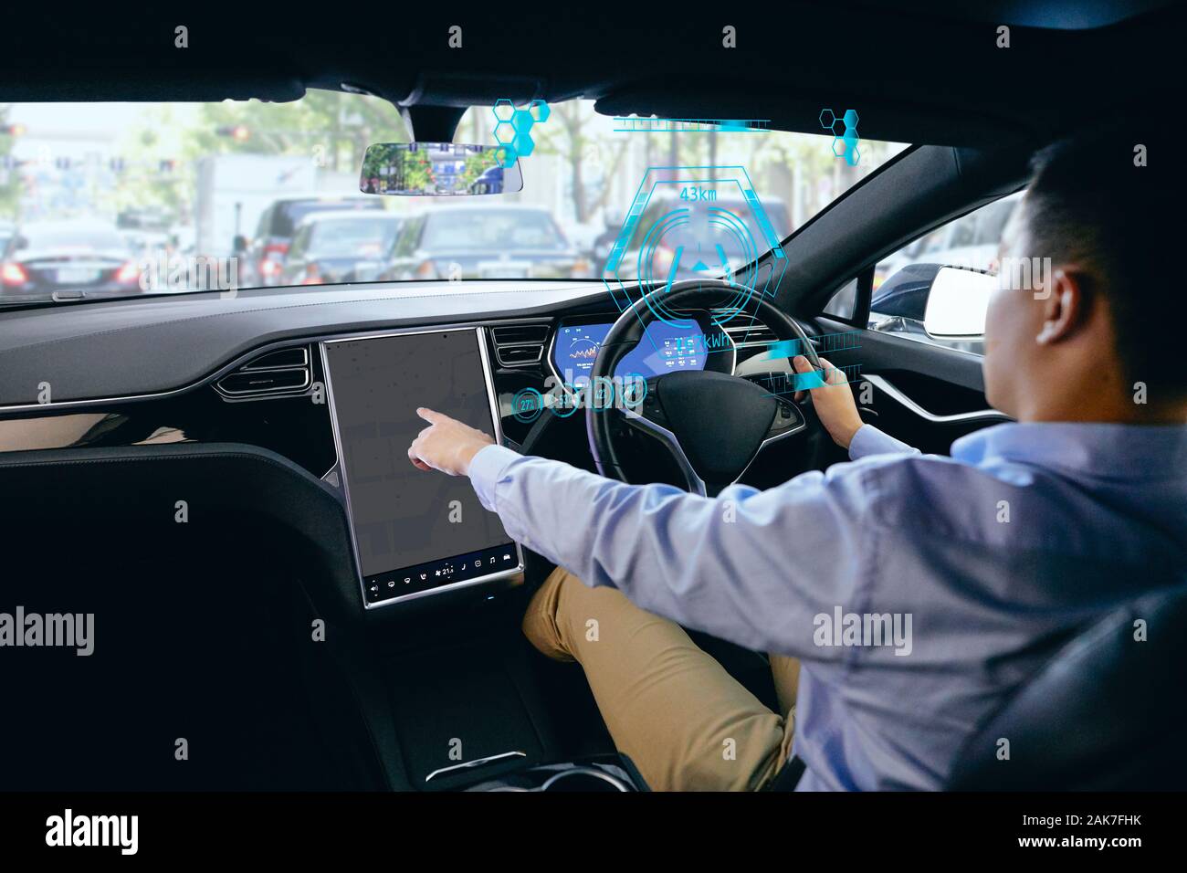 Japanese man in self driving car Stock Photo - Alamy