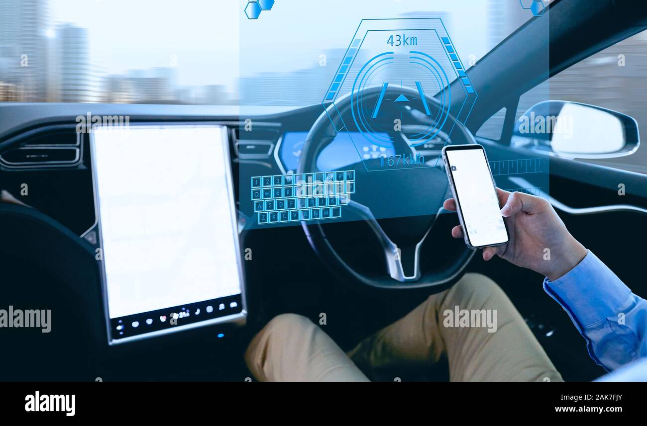 Japanese man in self driving car Stock Photo - Alamy