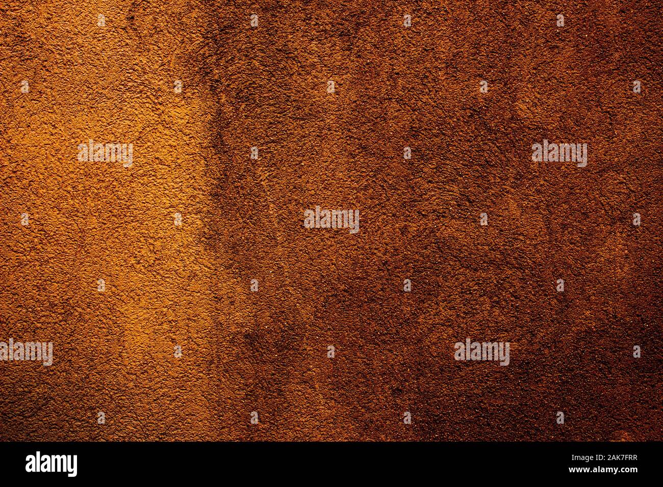 Copper colored background with textures of different shades of copper ...