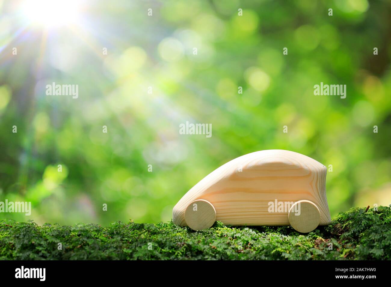 Wooden model car in the woods Stock Photo - Alamy