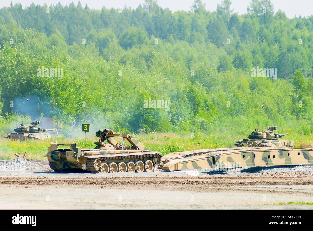 Bridge layer MTU-72 in action under tank cover Stock Photo - Alamy