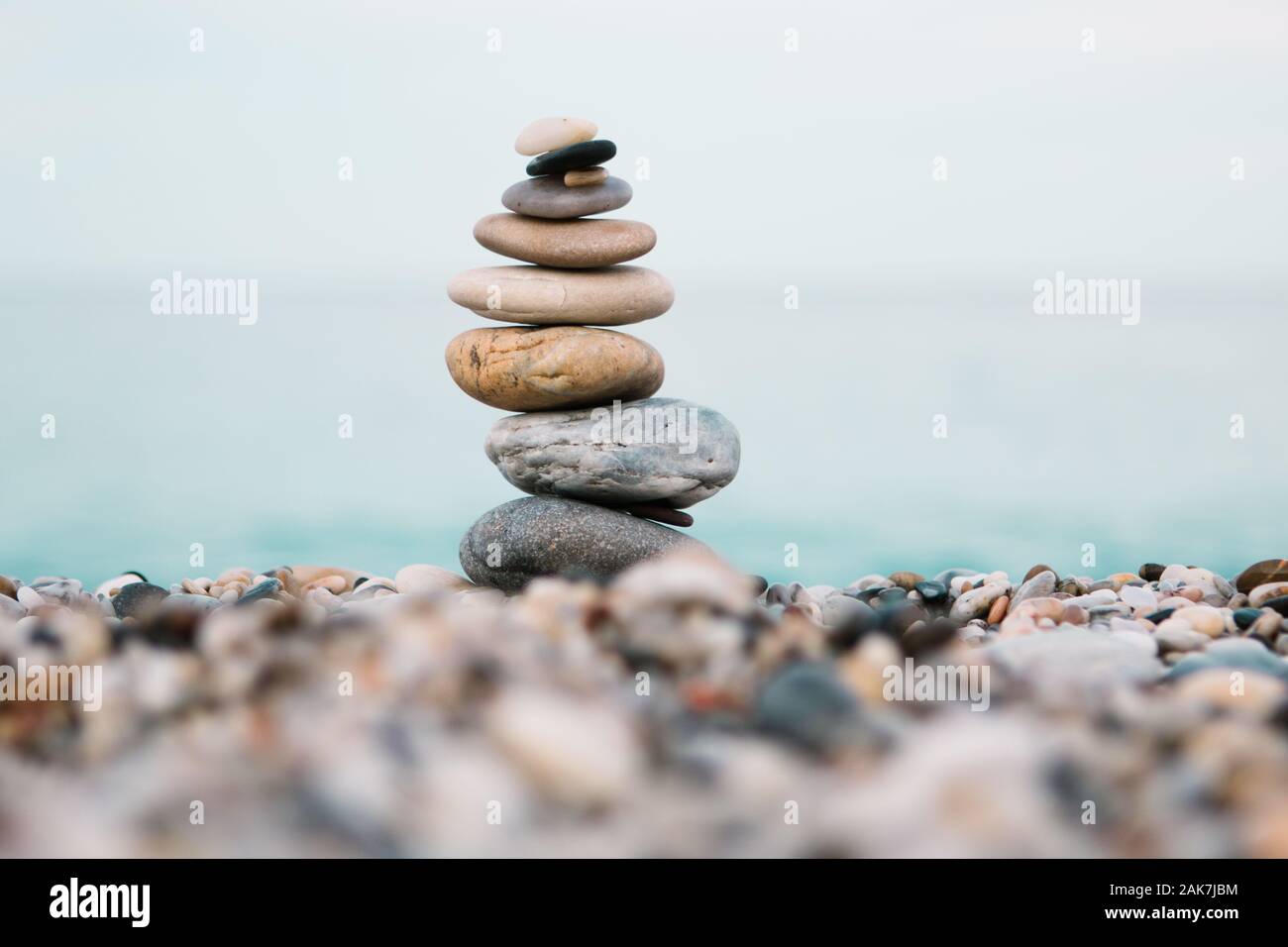 Spa and wellness background. Stack of pebble stones on the beach Stock ...