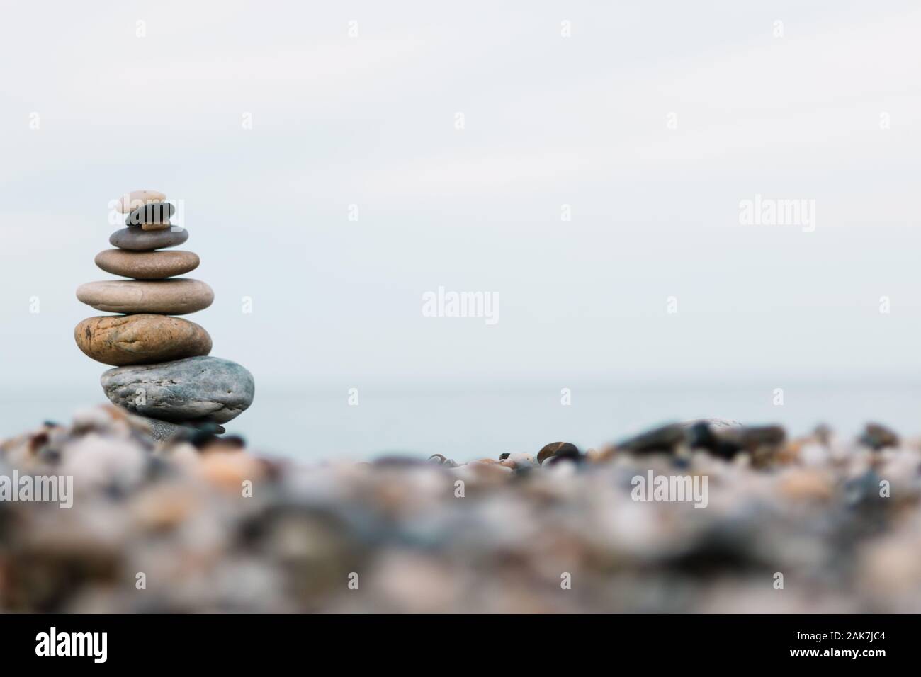 Stack of pebble stones on the beach Stock Photo - Alamy