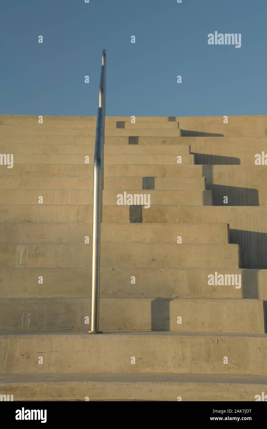 Close up, illustration of steps leading up into blue sky, climbing ...