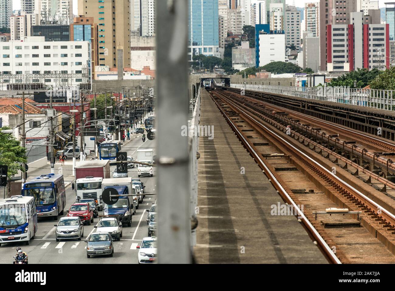 2020, january; Sao Paulo, Brazil. Train rail side by side with a big ...