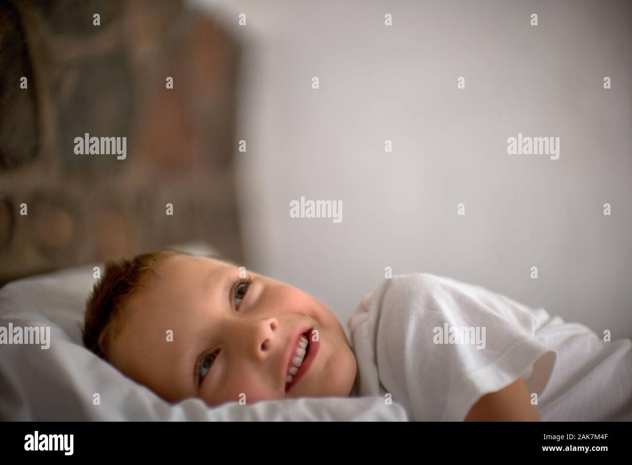 Boy in his bed Stock Photo - Alamy