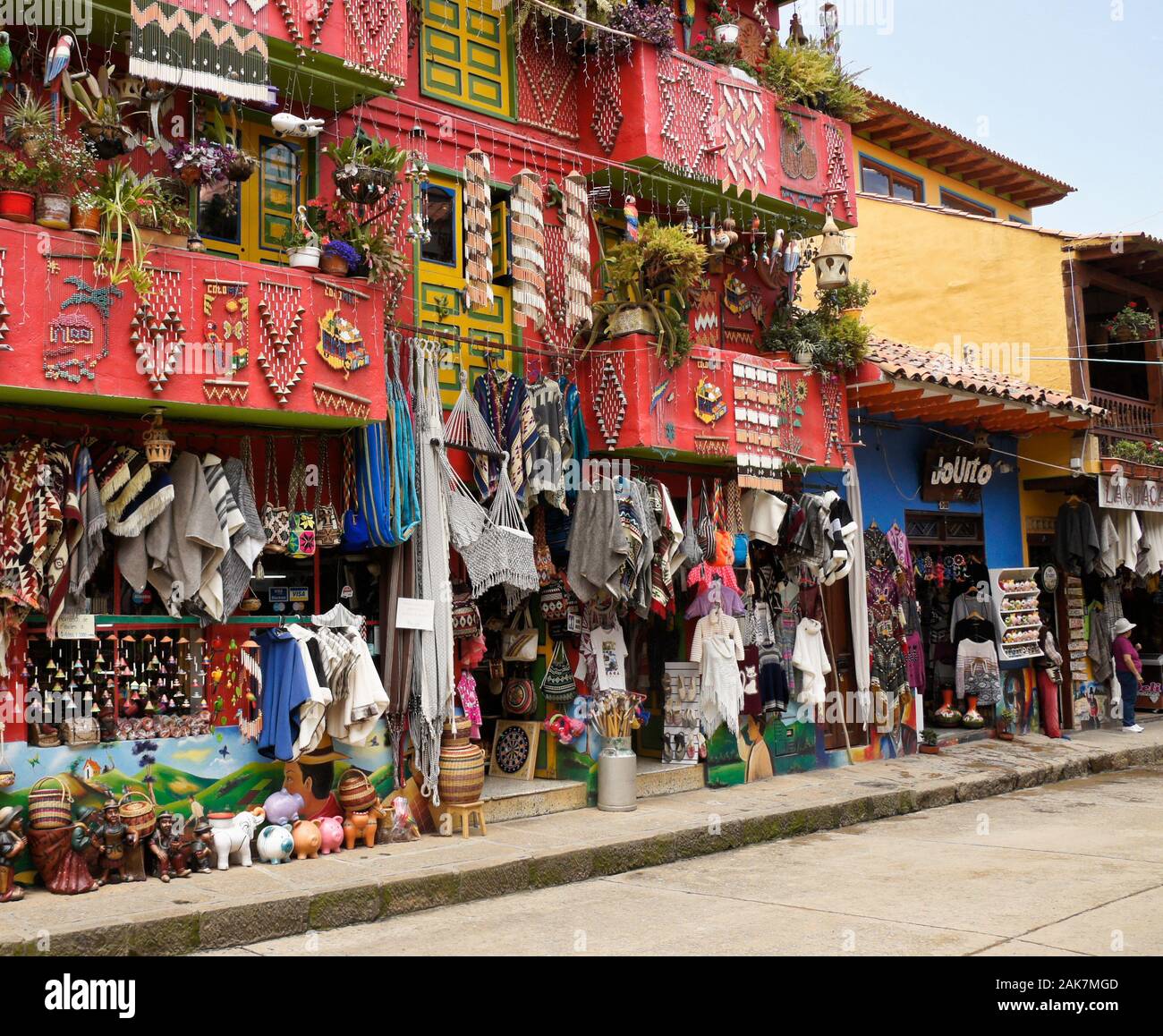Colorful handicraft shops along main street of Raquira, Colombia (the ...
