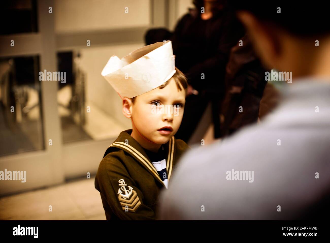 View of a sad boy standing Stock Photo - Alamy