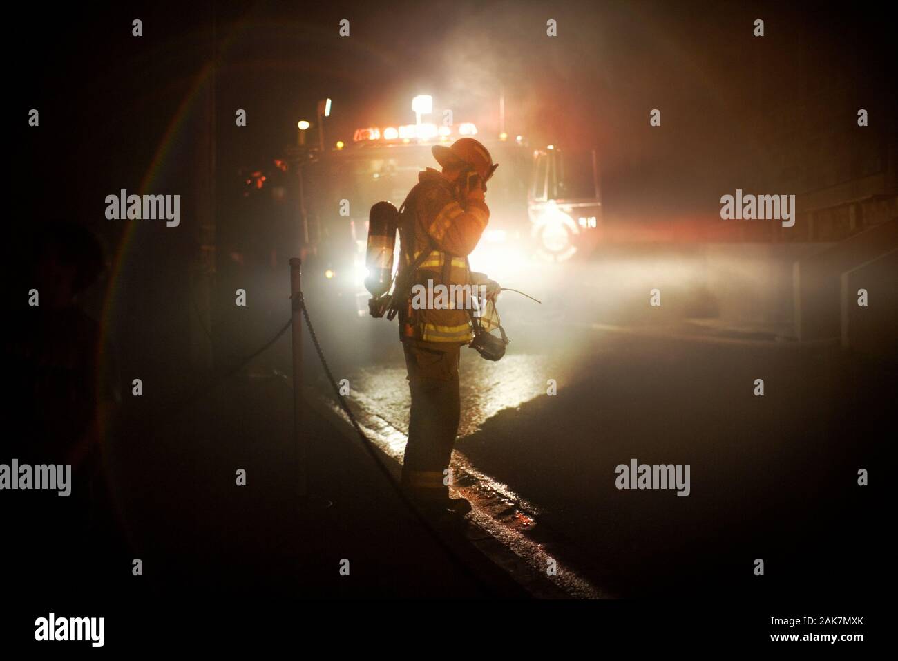 Fire fighter talking hi-res stock photography and images - Alamy