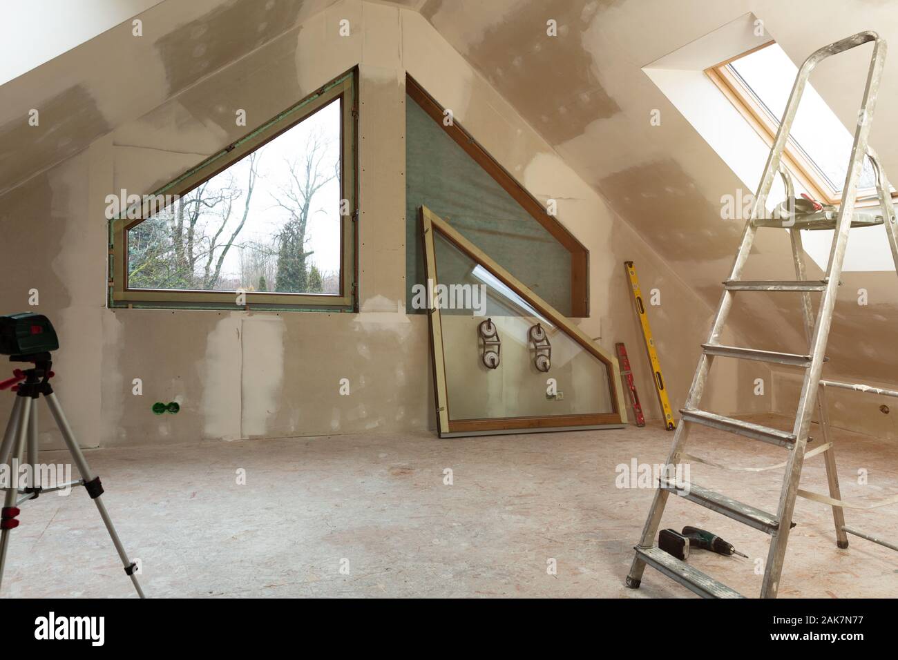 PVC window instalation in a new insulated and filled dry wall attic ...