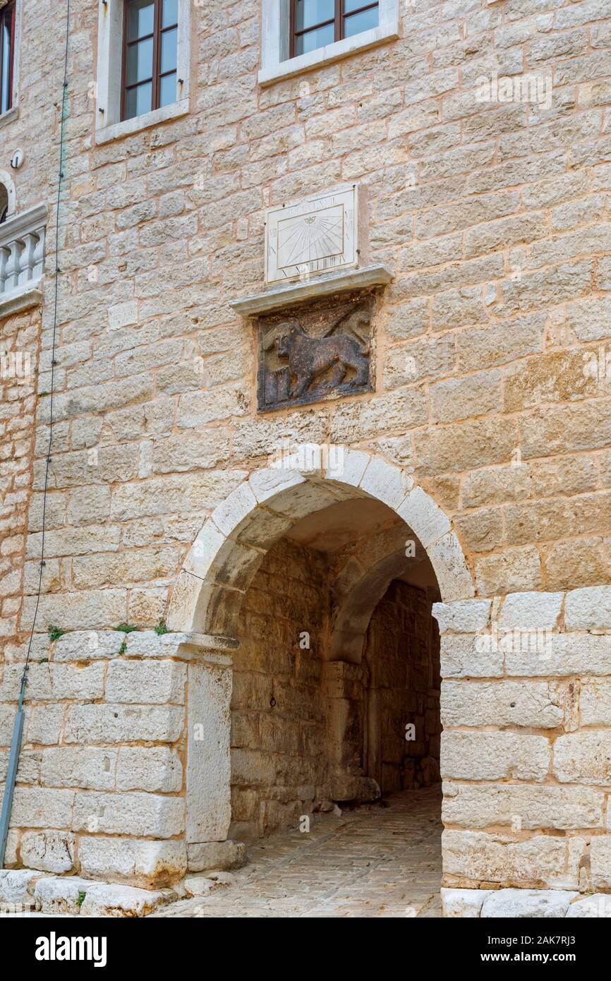 Soardo – Bembo Castle entrance arch with lion crest and sundial in the ...