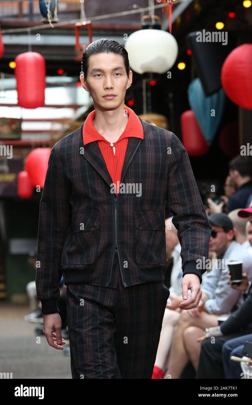 A model showcases during a catwalk show at Oliver Spencer show, London ...