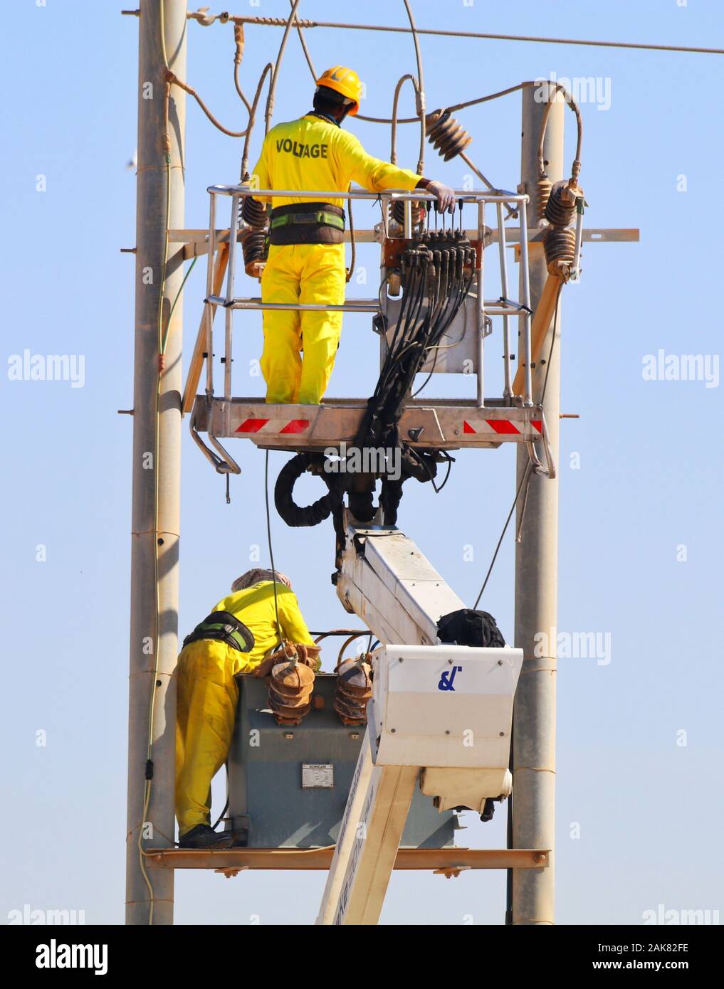Electricity maintenance work going on at daytime. This kind of job is ...