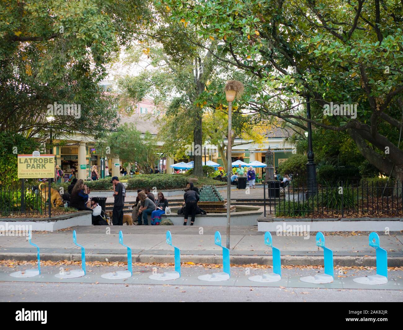 New Orleans, USA. December 2019. People sitting on benches at LaTrobe ...
