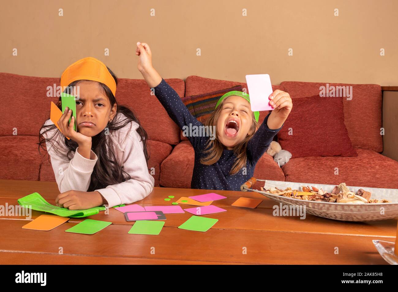 Kids playing cards hi-res stock photography and images - Alamy
