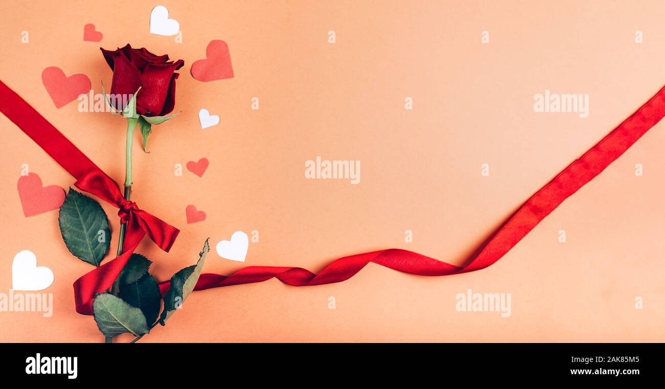 Red rose with message card Stock Photo - Alamy