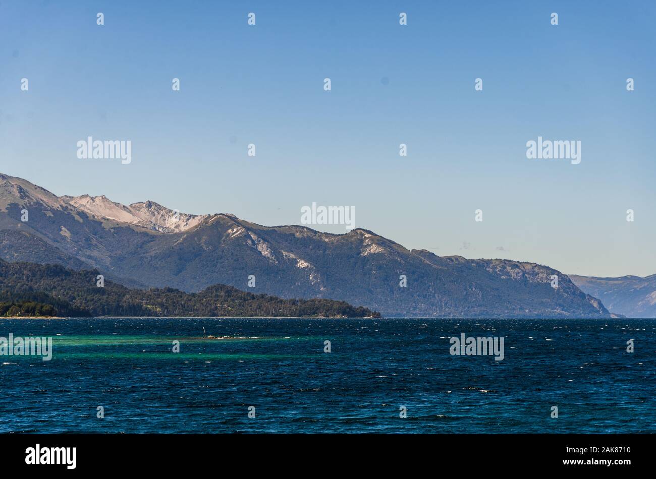 Landscape of blue lakes, Andes mountains, and forest in Patagonia ...
