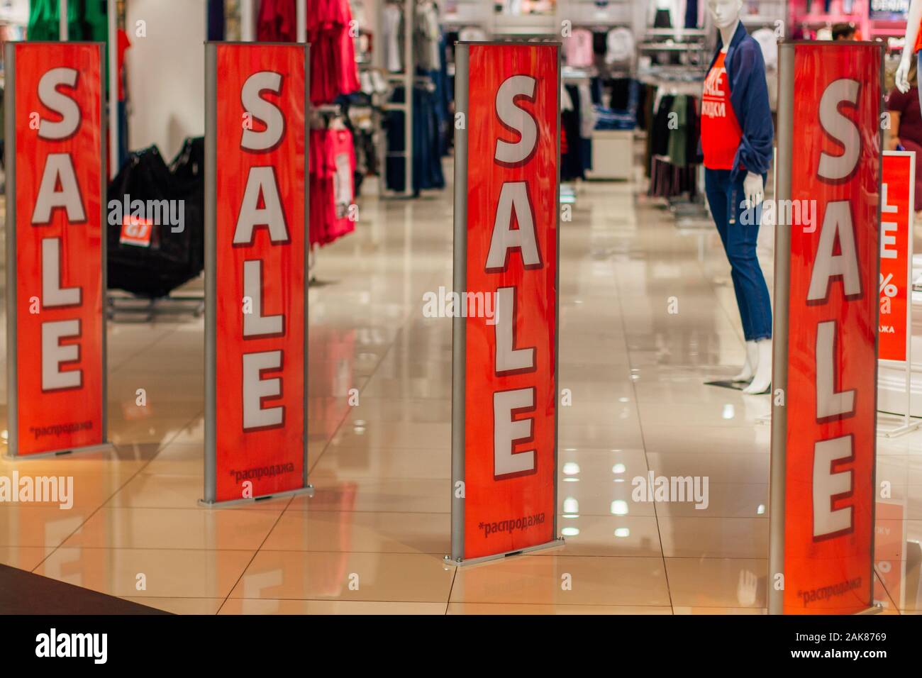 Entrance in shop with a sale sign Stock Photo - Alamy