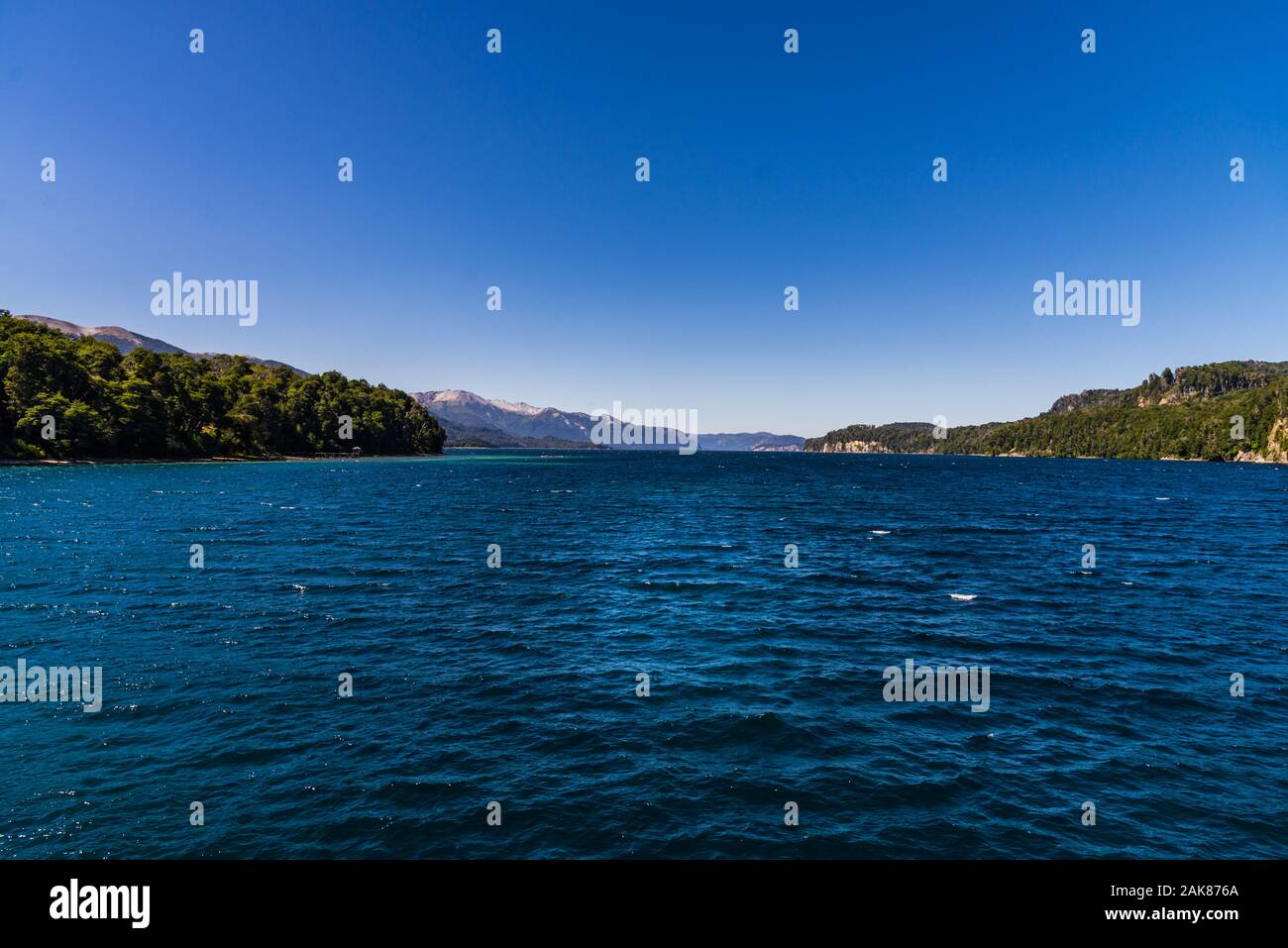 Landscape of blue lakes, Andes mountains, and forest in Patagonia ...