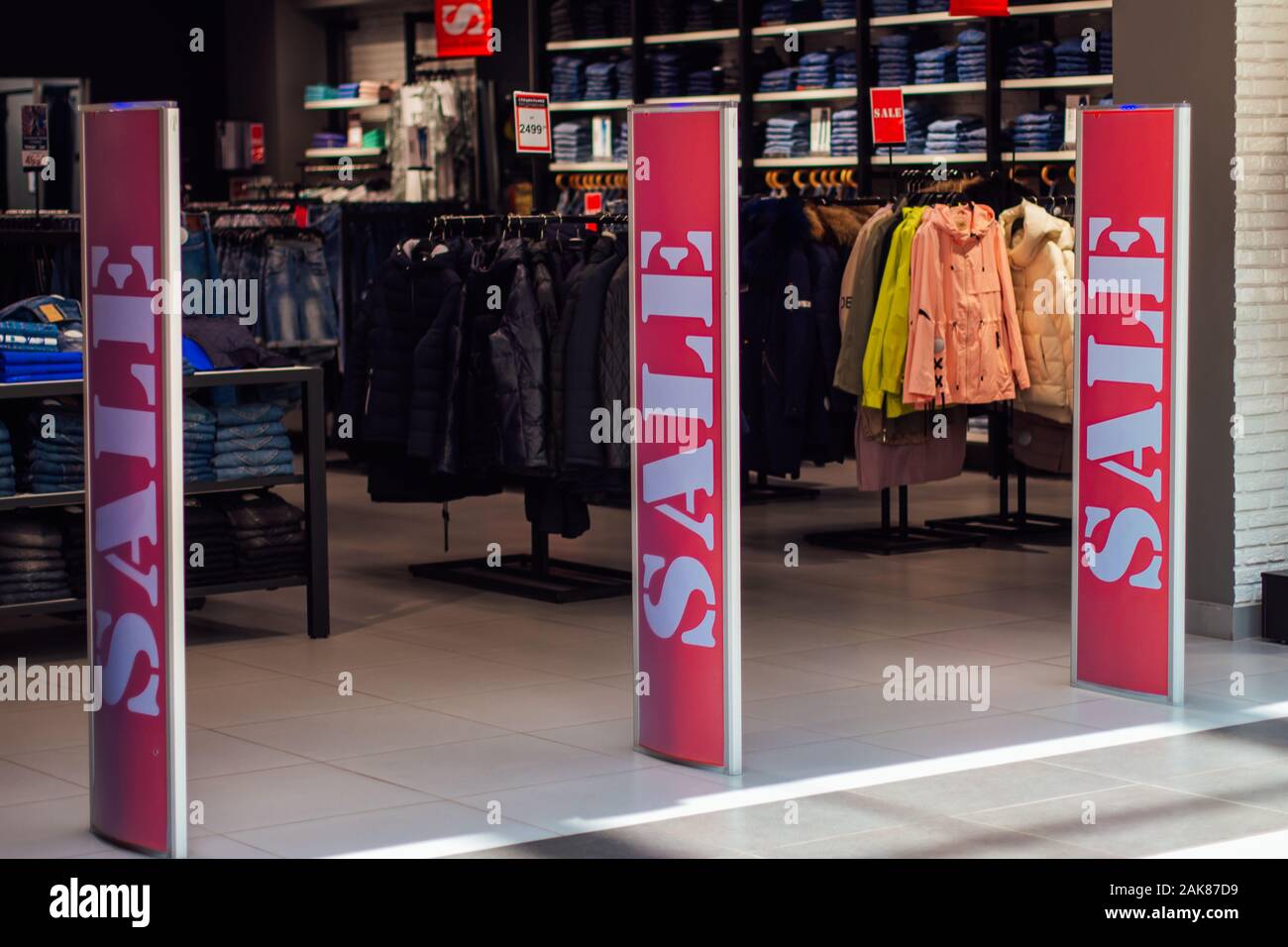 Entrance in shop with a sale sign Stock Photo - Alamy