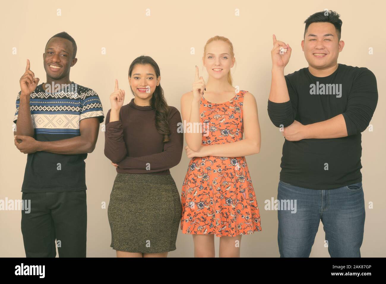 Studio shot of happy diverse group of multi ethnic friends smiling ...