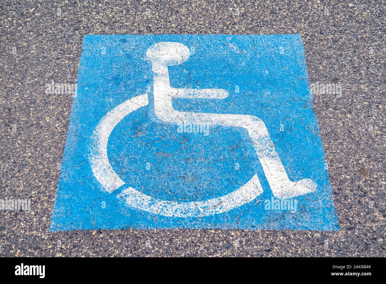 Disabled or Handicapped road sign on asphalt Stock Photo - Alamy