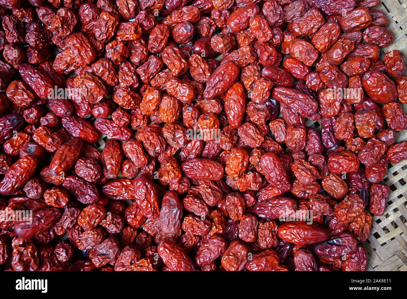 Group stacks of traditional Chinese medicine, dried red dates Stock ...