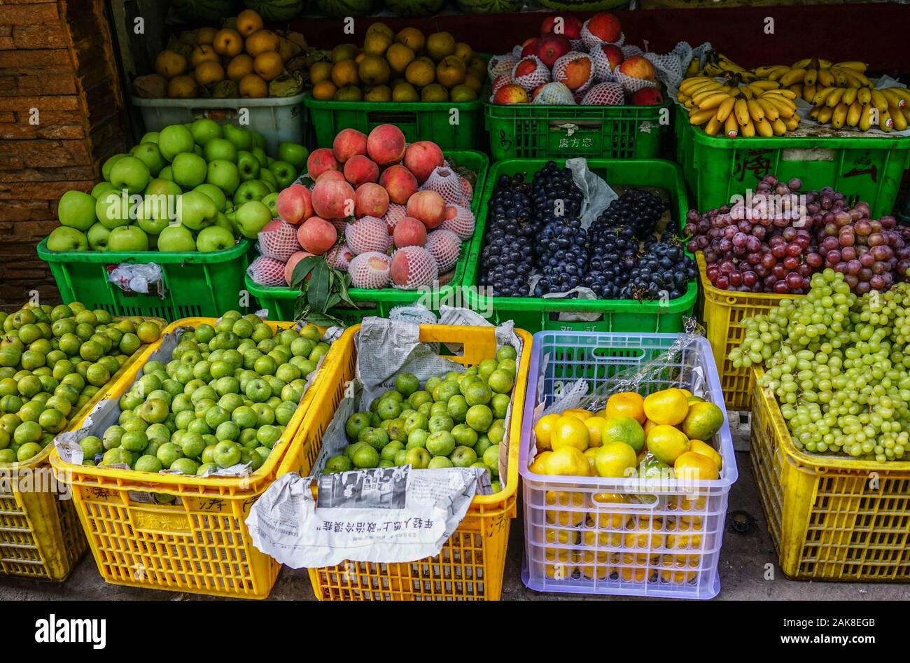 Sichuan, China - Aug 16, 2016. Various colorful fresh fruits at rural ...