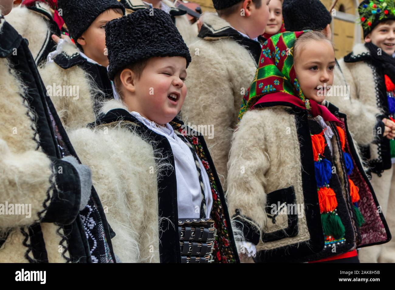 Children in traditional clothes of Maramures. Group of children at ...