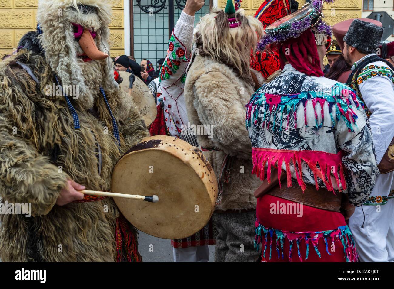 Christmas carols and games with masks. Big carnival parade, hundreds of ...