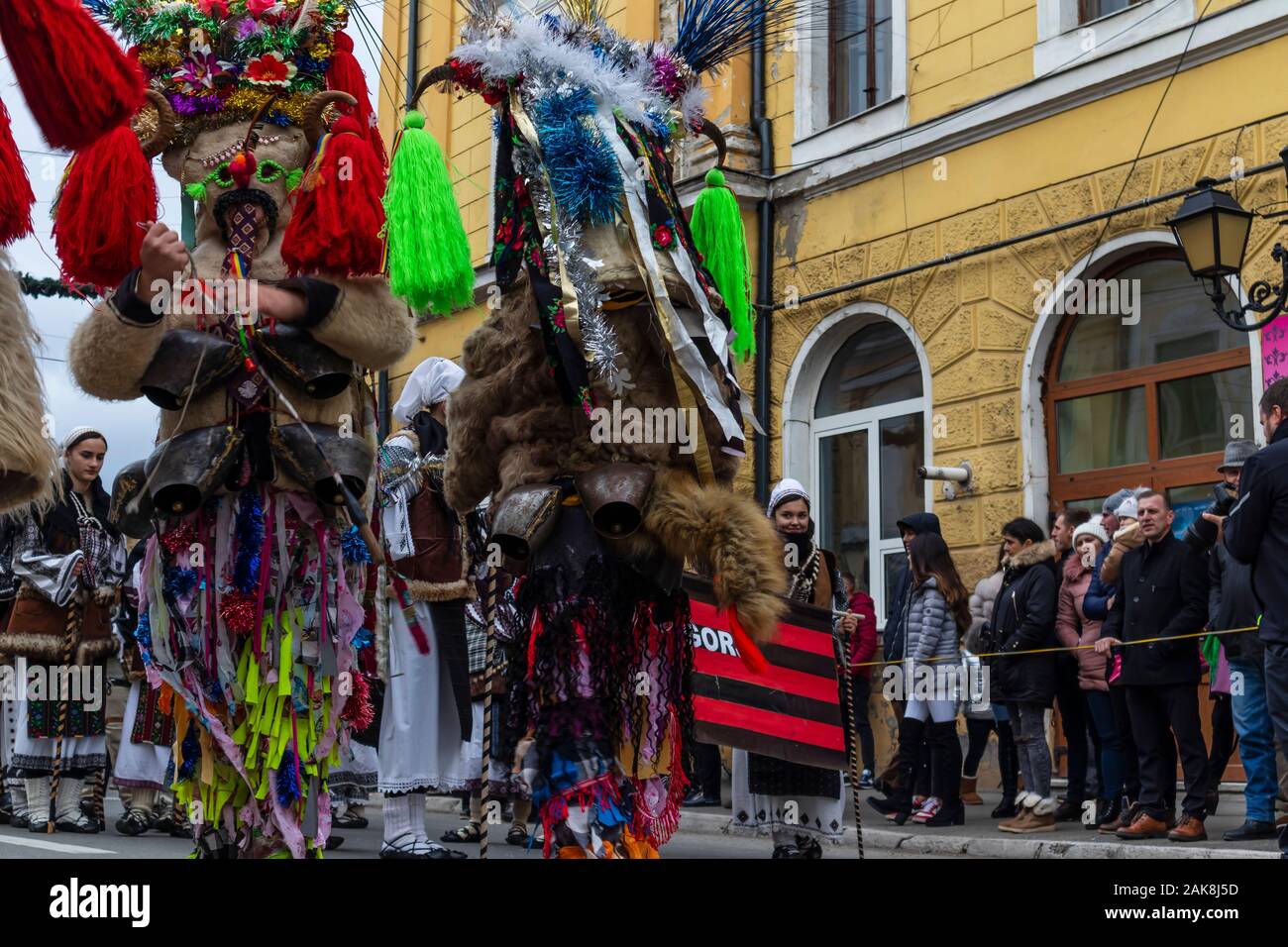 Christmas carols and games with masks. Big carnival parade, hundreds of ...