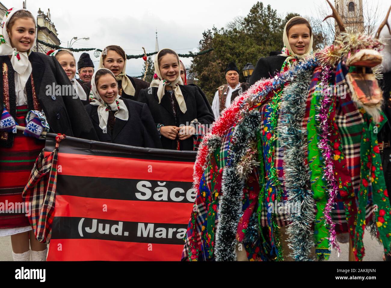 Christmas carols and games with masks. Big carnival parade, hundreds of ...