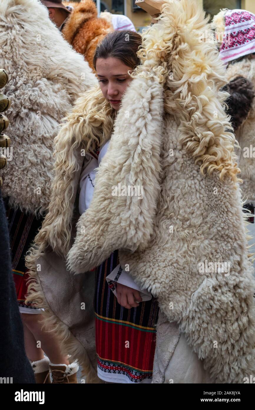 Christmas carols and games with masks. Big carnival parade, hundreds of ...