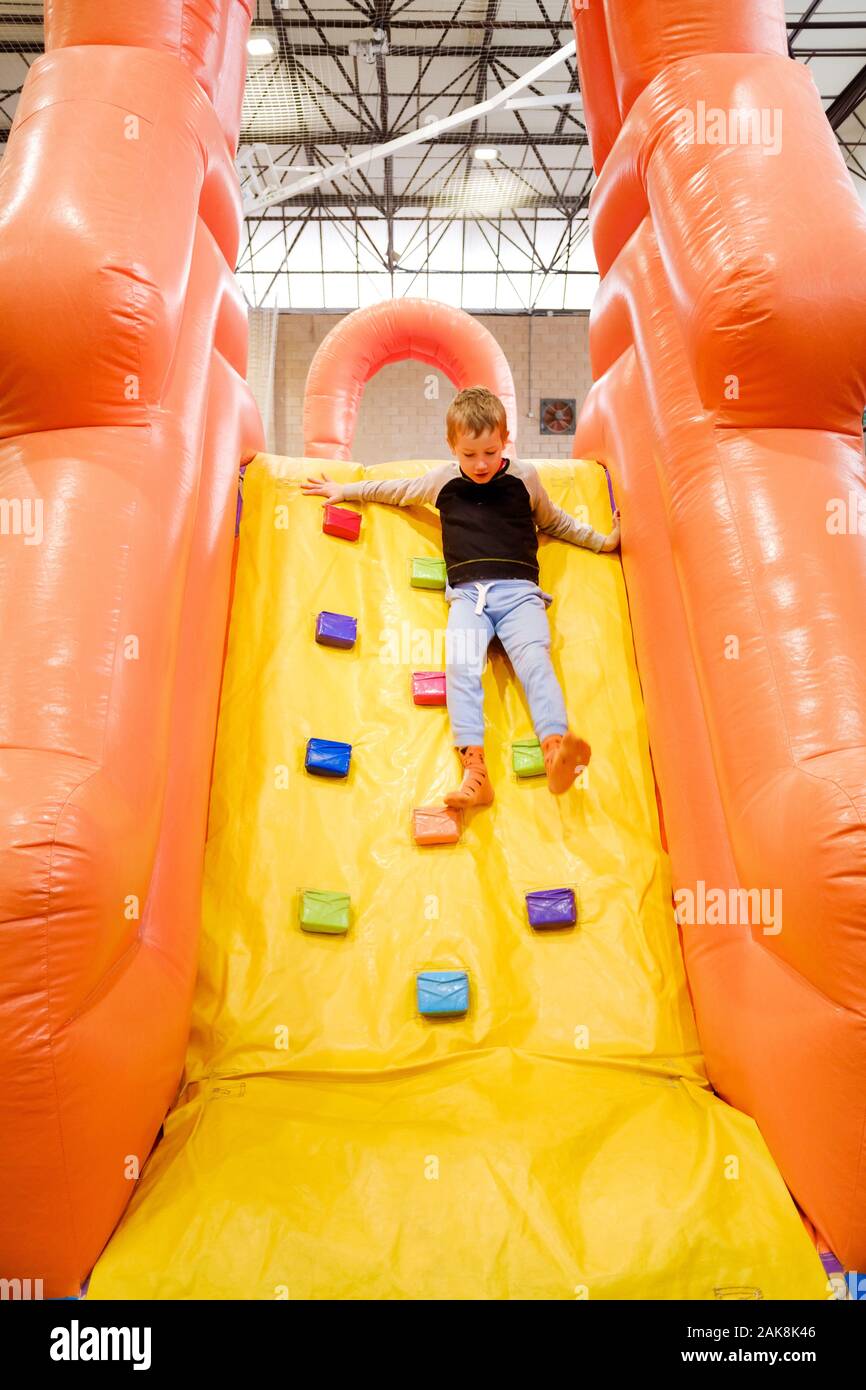Children's fair with inflatable castles for jumping and bouncing ...