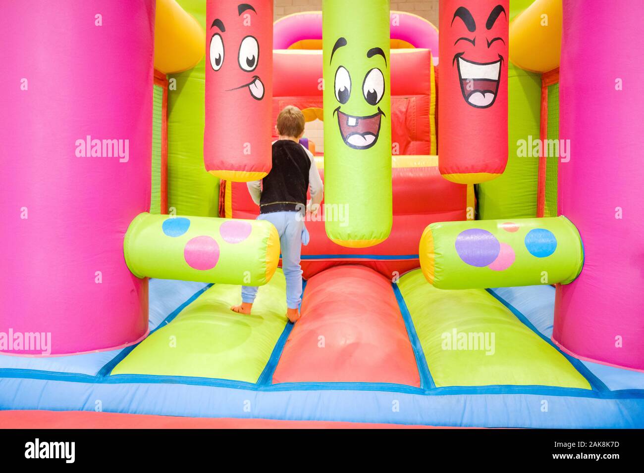 Kids play area with bouncy castle hi-res stock photography and images ...
