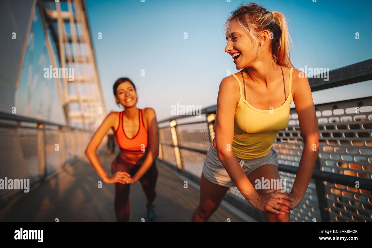 Fitness, sport, people, exercising and healthy lifestyle concept. Happy ...