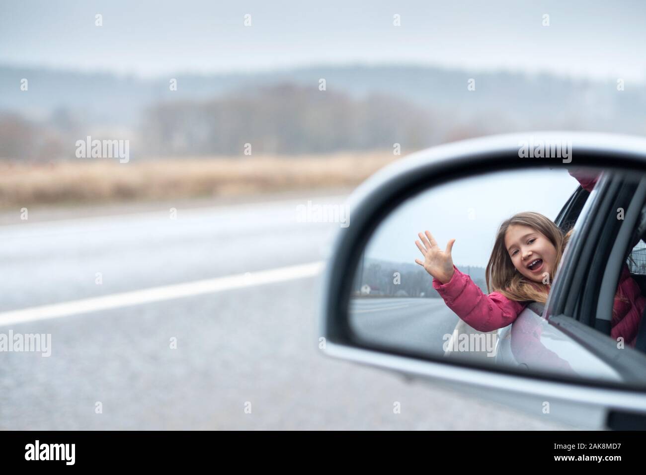 Kid girl wind car hi-res stock photography and images - Alamy