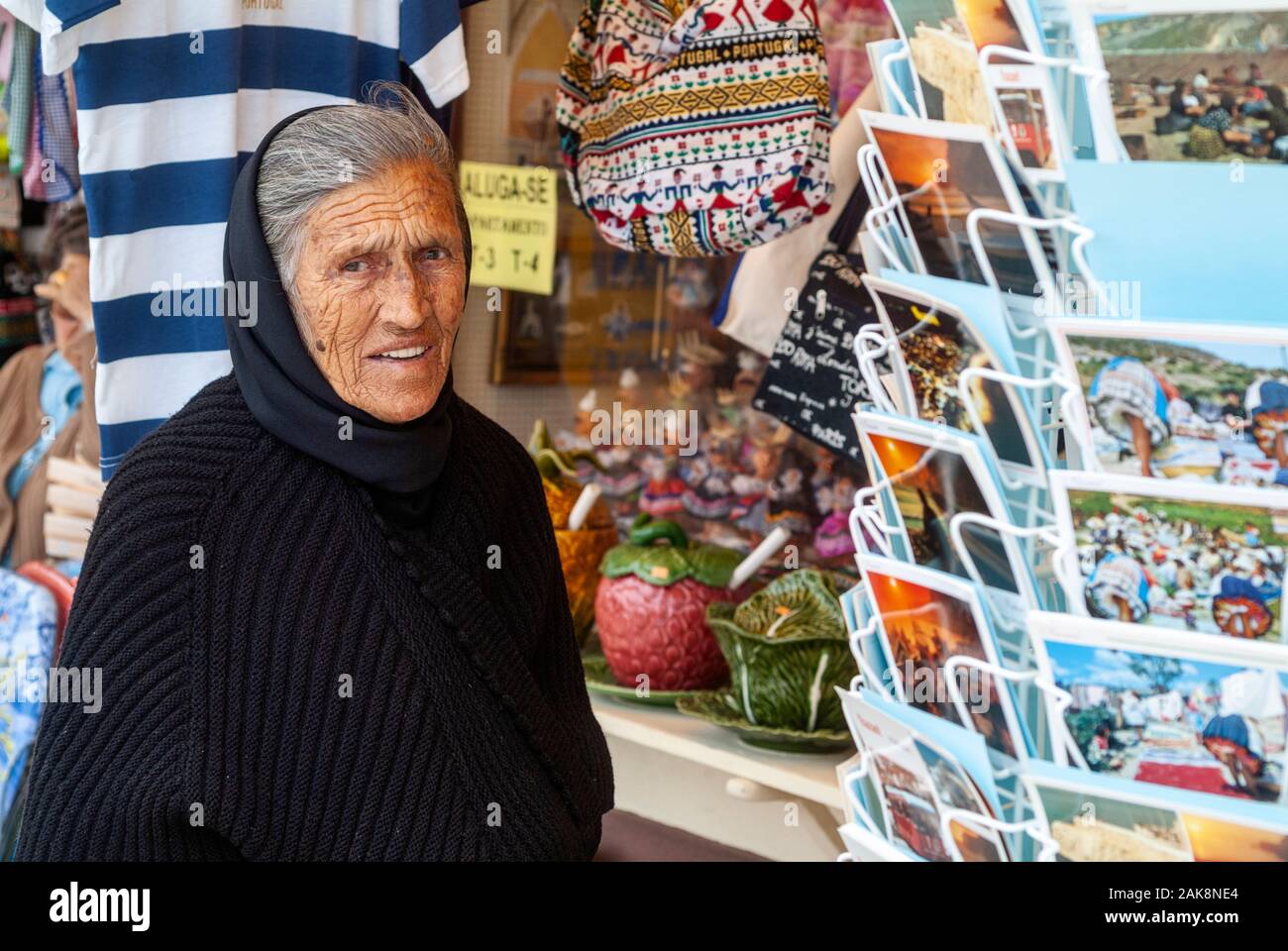 old women in typical black clothes in Nazare, Portugal Stock Photo - Alamy