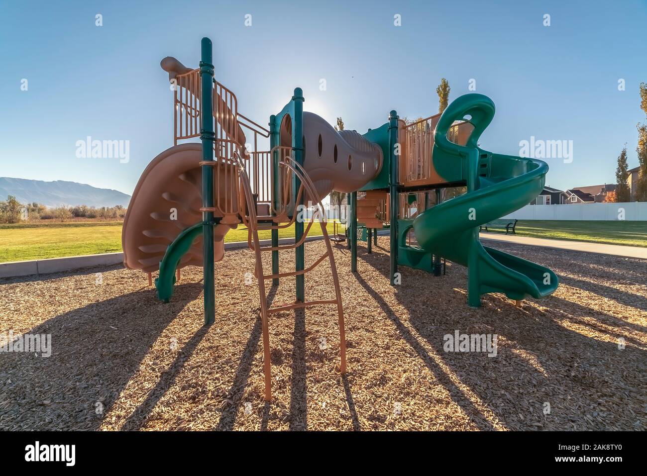 Colorful twisted slides in a kids playground Stock Photo - Alamy
