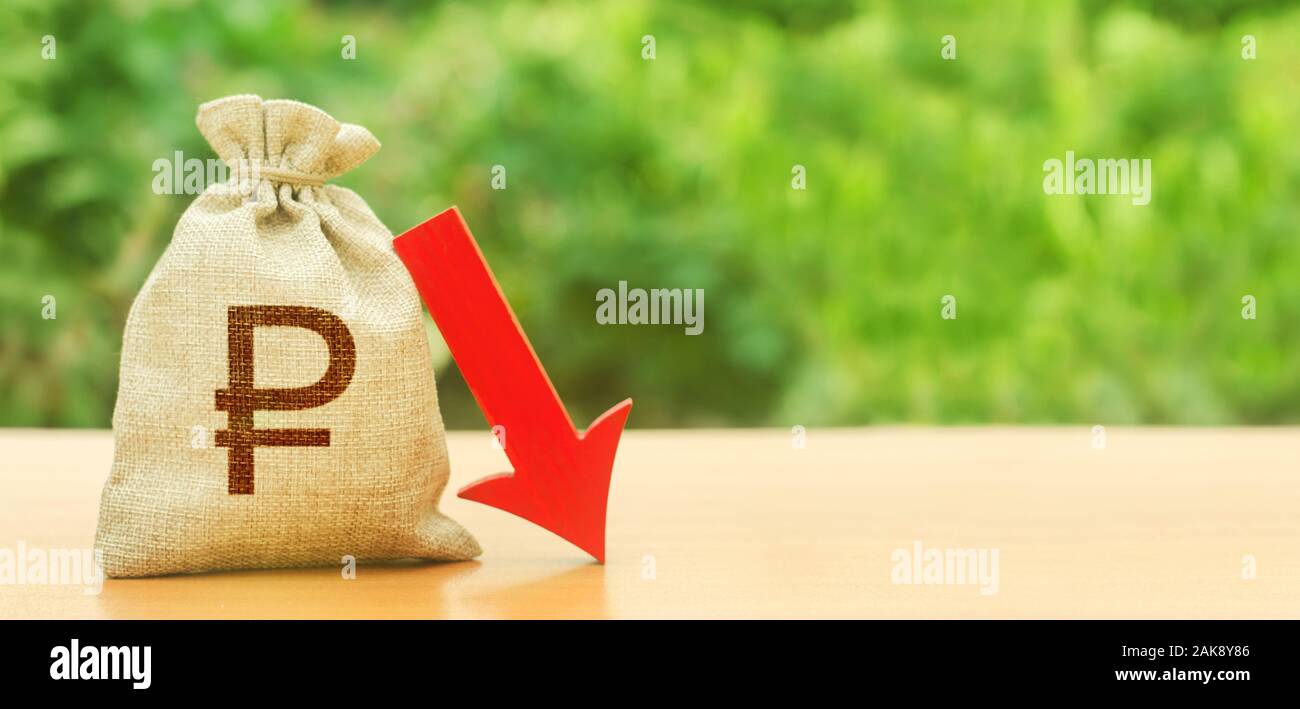 Russian ruble money bag and red arrow down. Depreciation of national ...